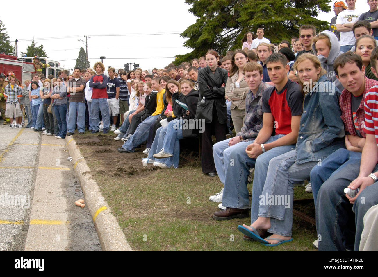 Prom Drunk Driving Demo Crowd of High school students look on Michigan ...