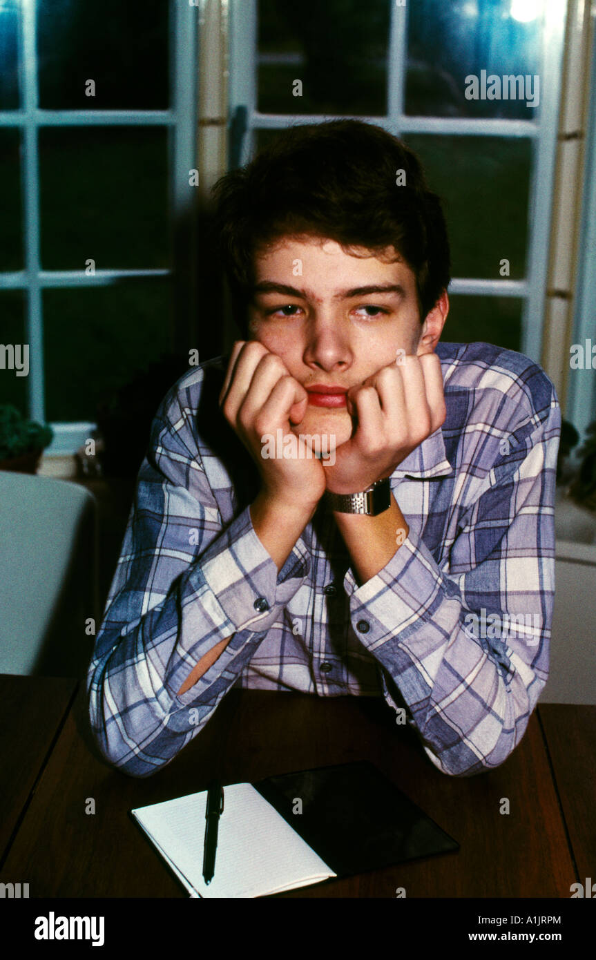 Teenage Boy Bored Wearing Silver Watch Stock Photo - Alamy