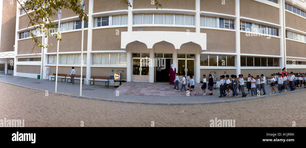 Abu Dhabi UAE School Children Entering School Stock Photo - Alamy