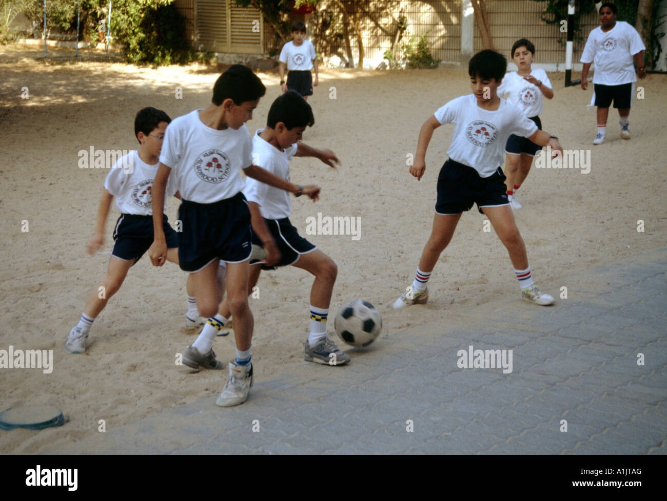 Abu Dhabi UAE Boys Playing Football Stock Photo - Alamy
