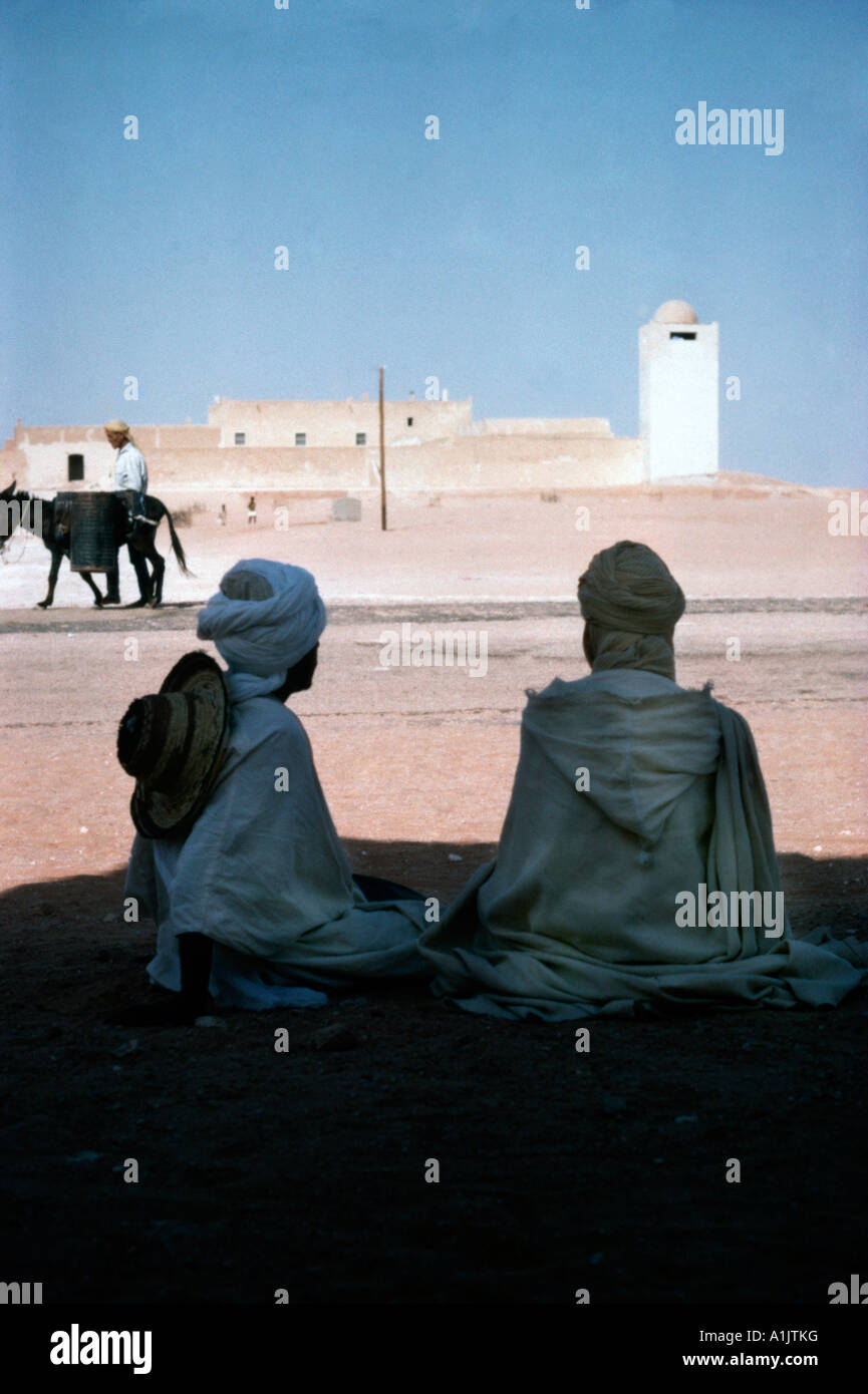 Two Men Algeria in front of Mosque Stock Photo - Alamy