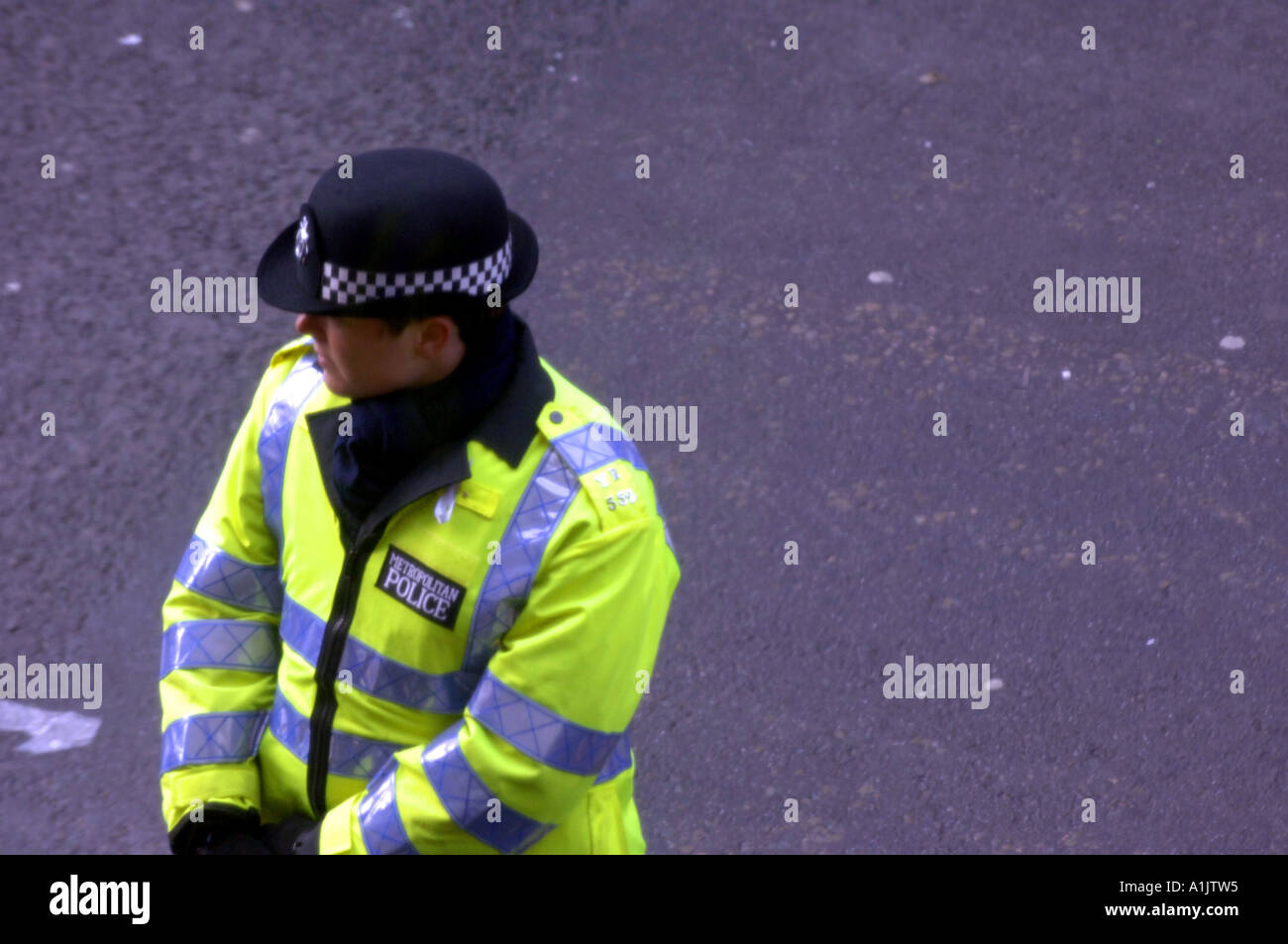 police woman female alone single road street day high visibility ...