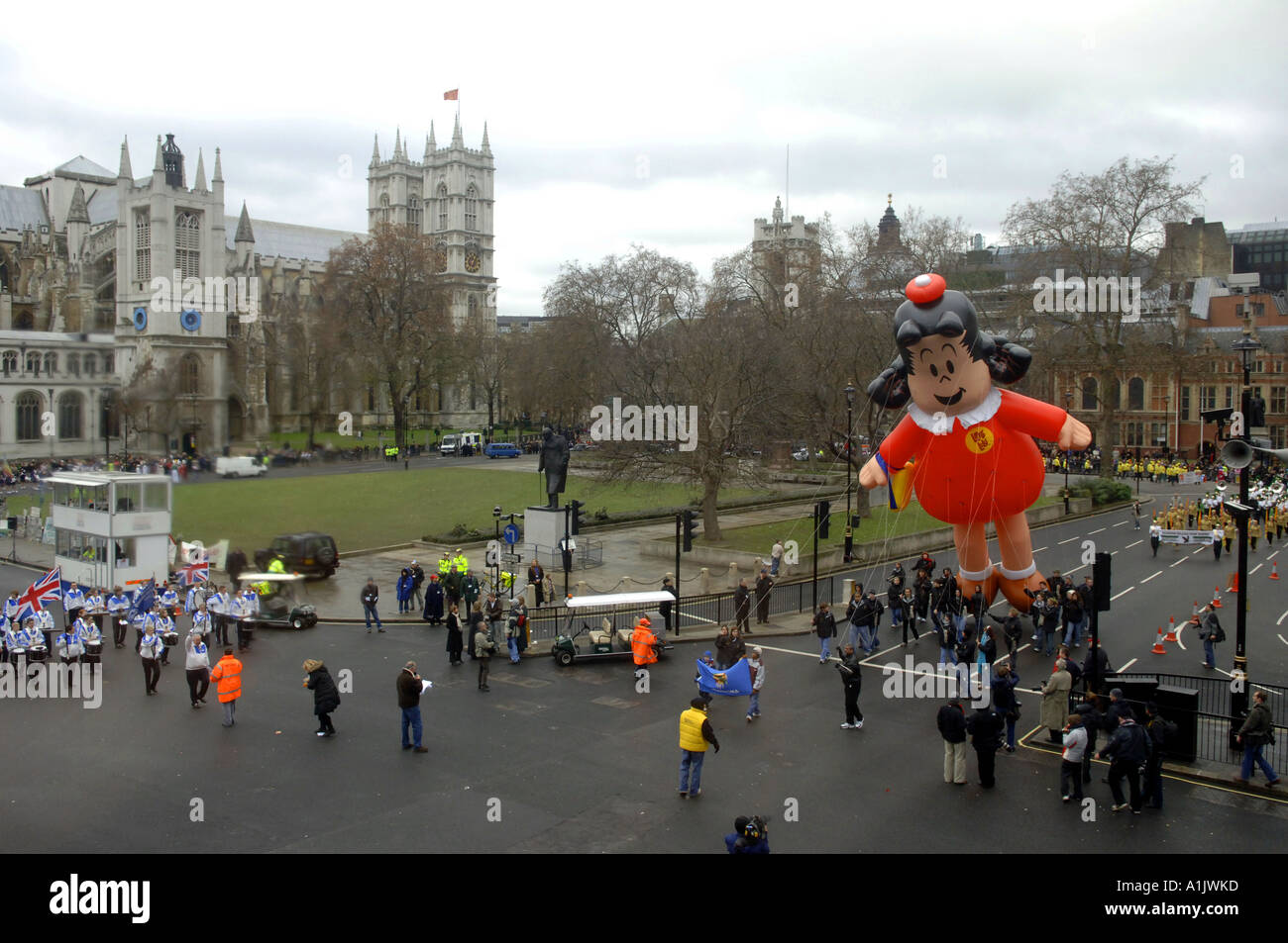 girl red dress inflatable puppet parliament street blow up huge giant ...