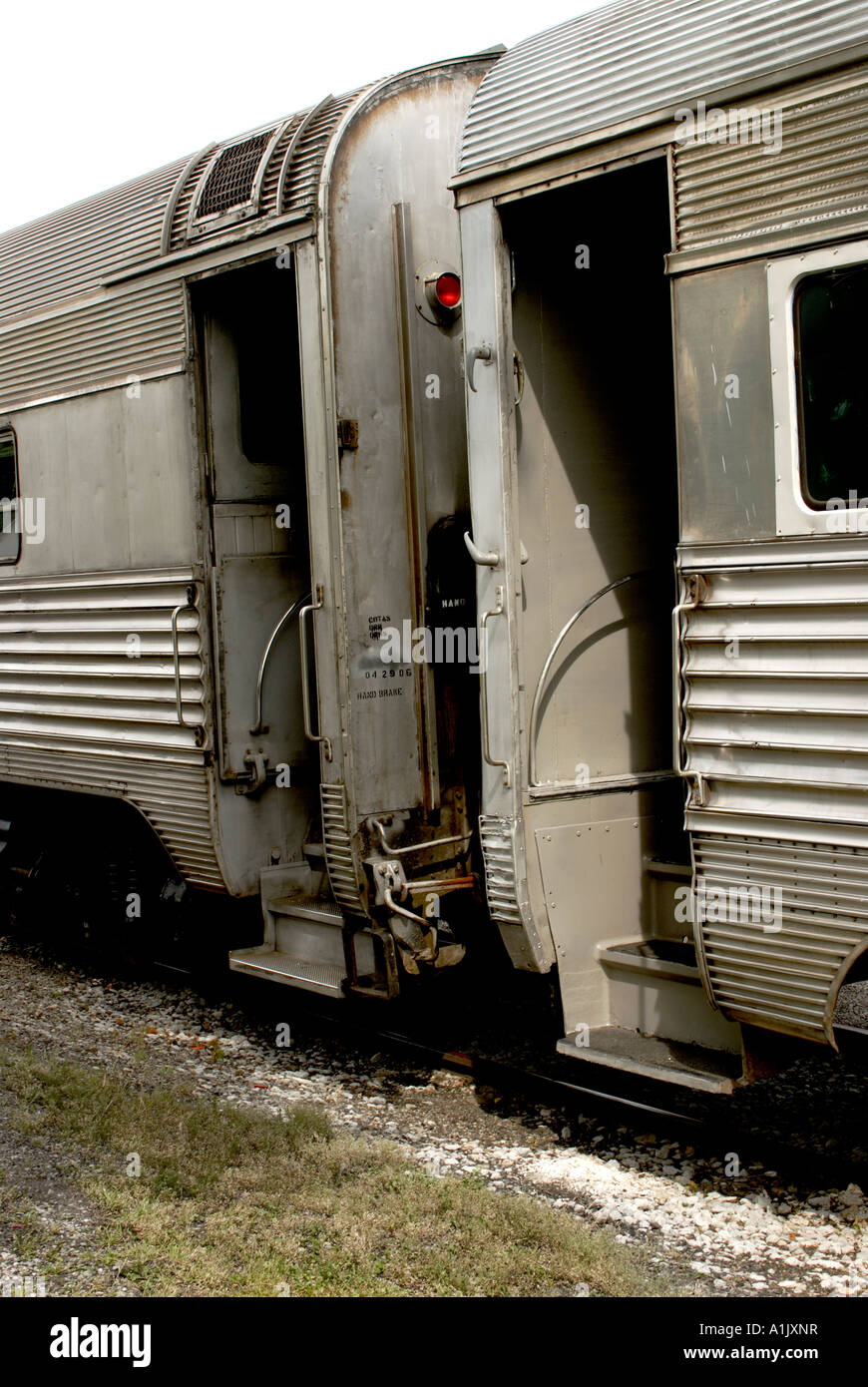 doors on silver train cars Stock Photo - Alamy