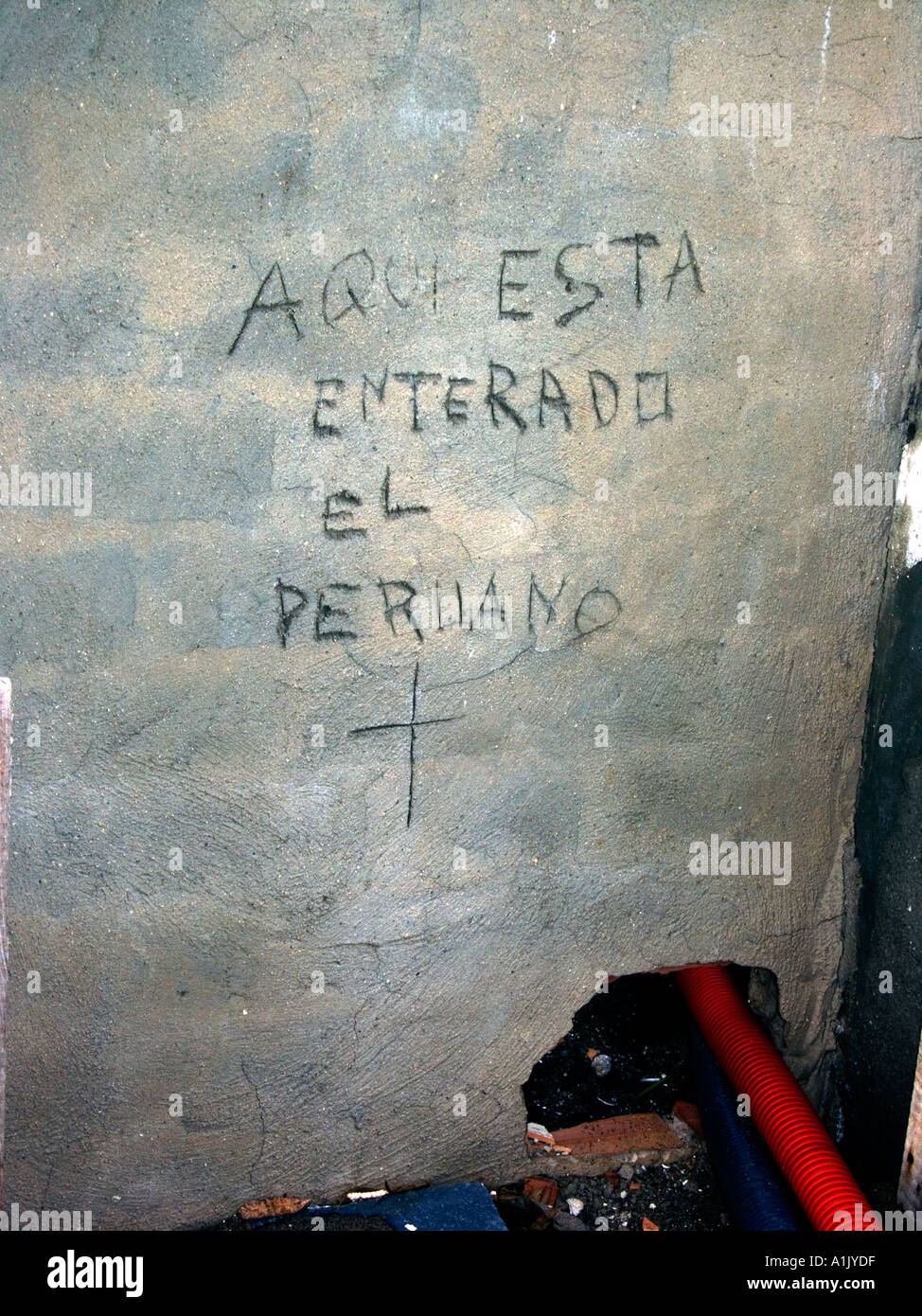 Concrete slab bearing the inscription Aqui Esta Enterado el Peruano ...