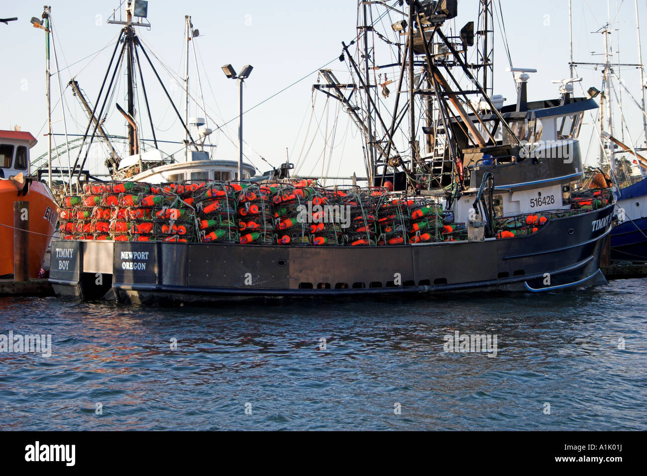 Commercial fishing boats loaded with crab pots Stock Photo - Alamy