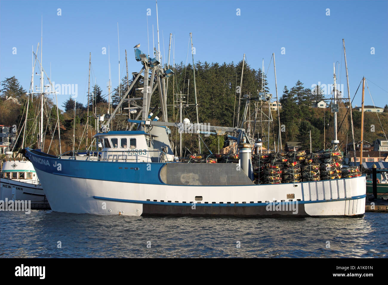 Commercial fishing boats loaded with crab pots Stock Photo - Alamy