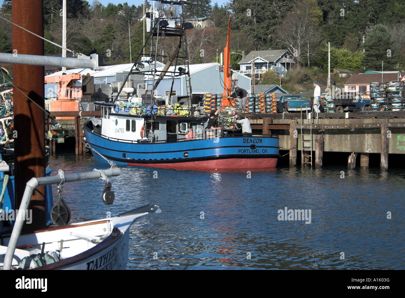 Commercial fishing boats loaded with crab pots Stock Photo - Alamy