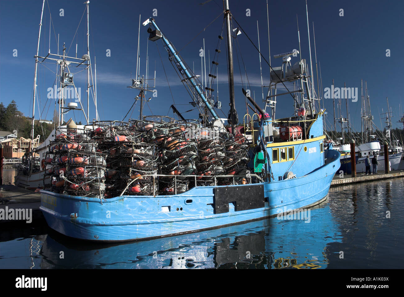 Commercial fishing boats loaded with crab pots Stock Photo - Alamy