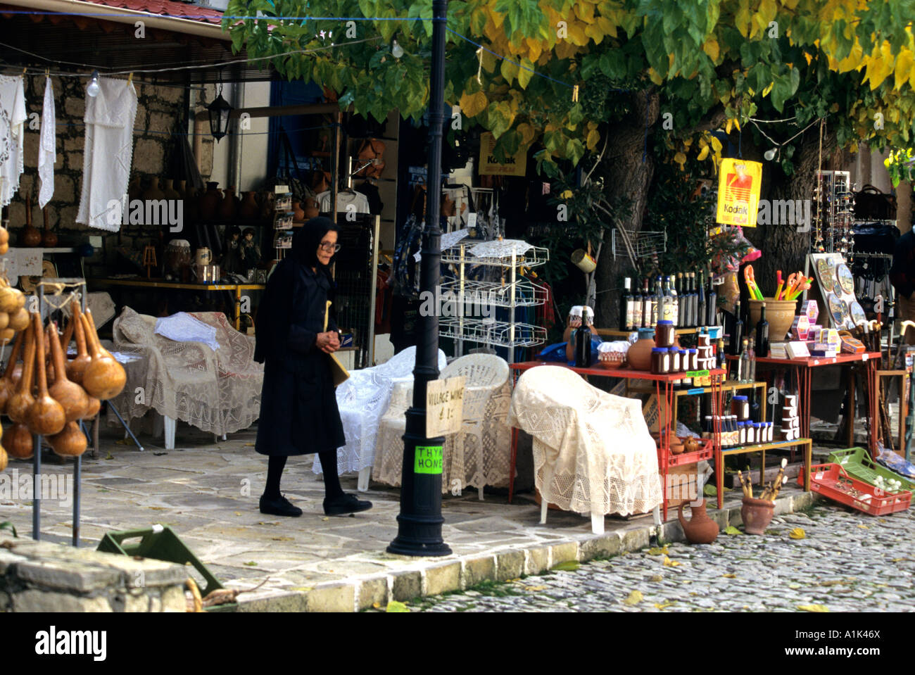 Storefront vendor stalls display many different items for sale in ...