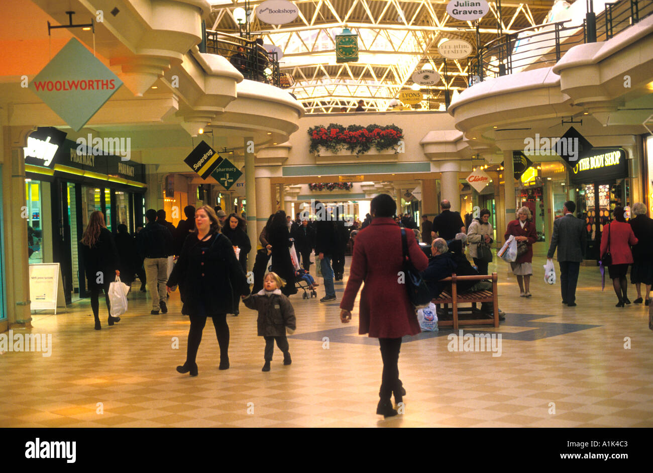 People in crowded shopping centre in London suburb Stock Photo - Alamy