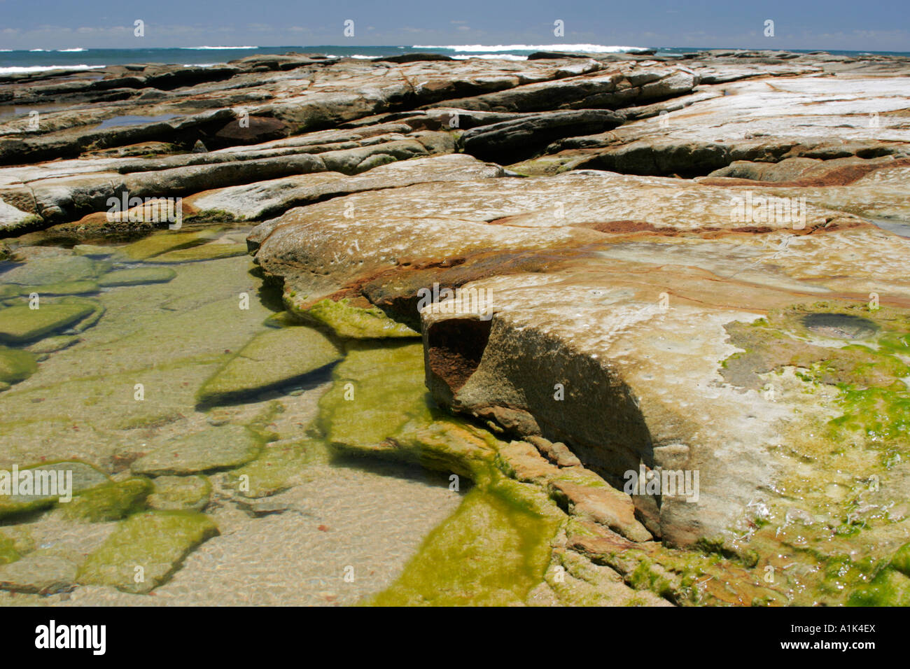 Colored rocks caloundra Stock Photo - Alamy