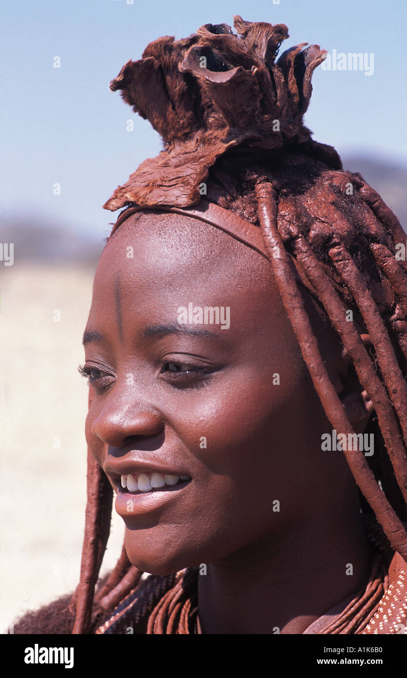 Young friendly himba woman distinctive hi-res stock photography and ...