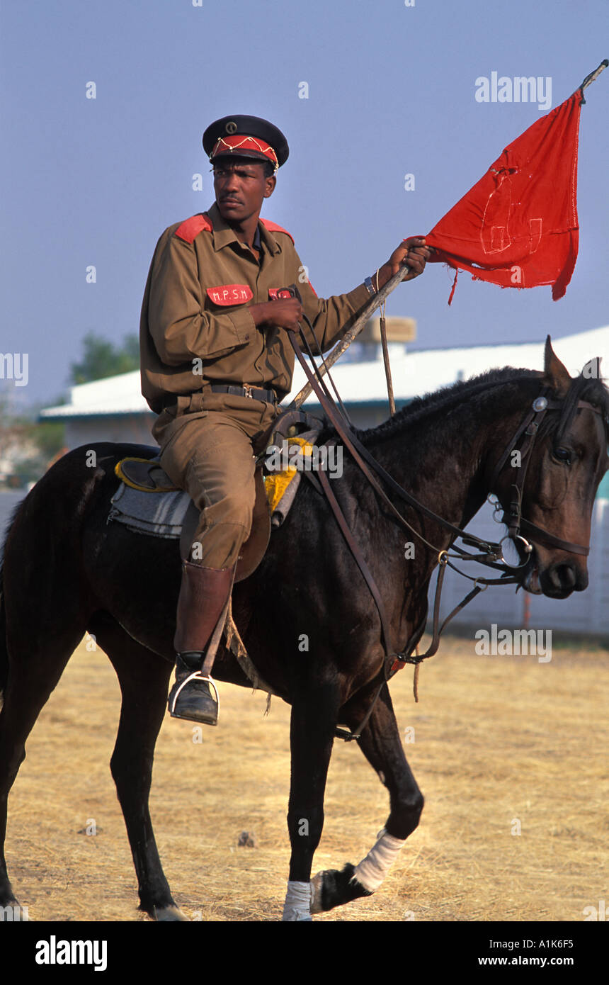 Member of paramilitary style group in uniform and on horseback for the ...