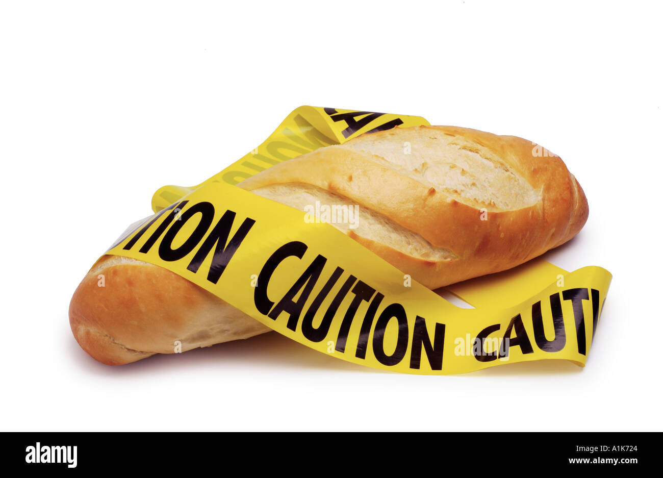 Low Carbohydrate diet Caution tape around loaf of bread Stock Photo - Alamy