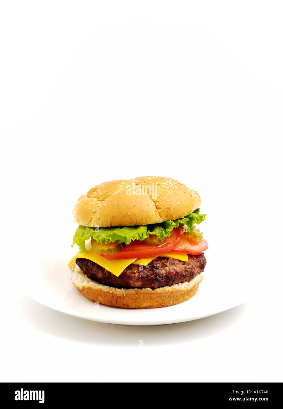 Hamburger on white plate Stock Photo - Alamy