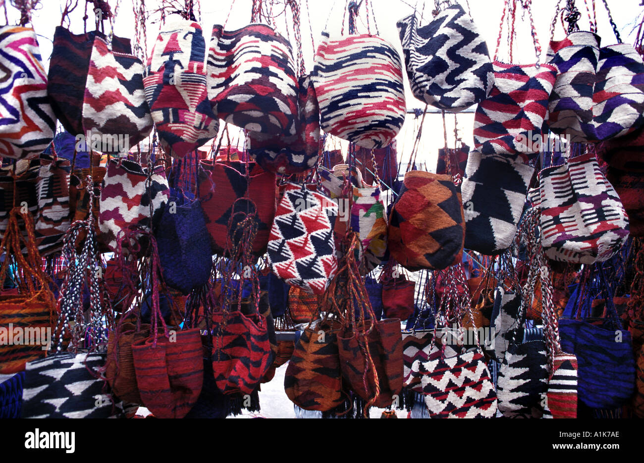 Colourful woven and plaited string bags for sale at Otavalo market ...