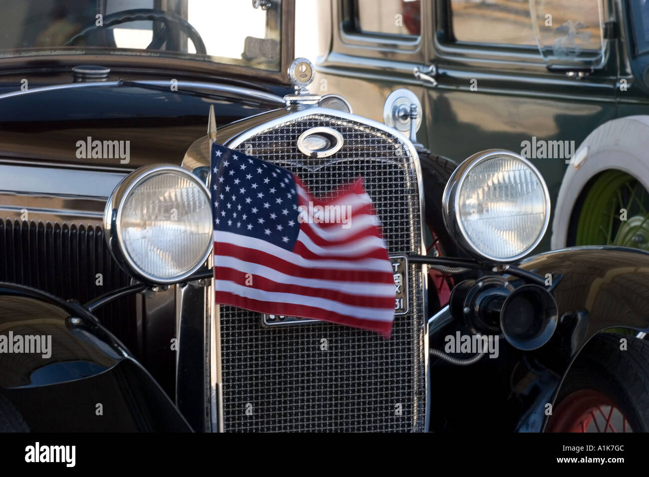 Car, old antique radiator and flag Stock Photo - Alamy