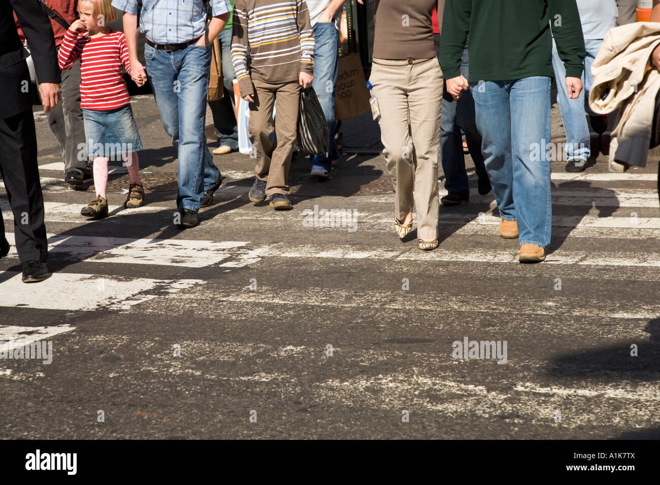 People crossing the street Mid town Manhattan New York City United ...