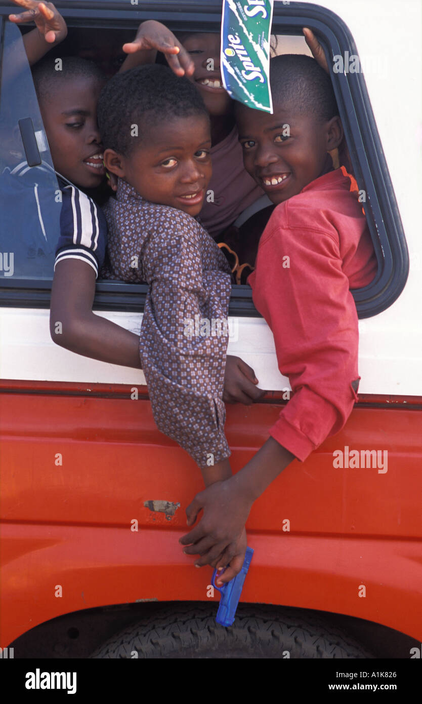 Local children in a playful mood onboard public transport People flock ...