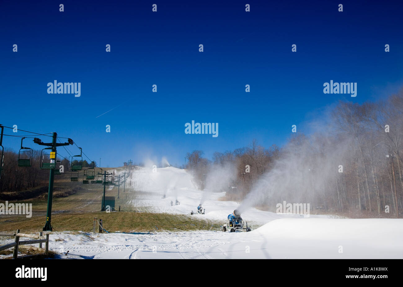 Snow blowers making snow at a ski resort Stock Photo - Alamy
