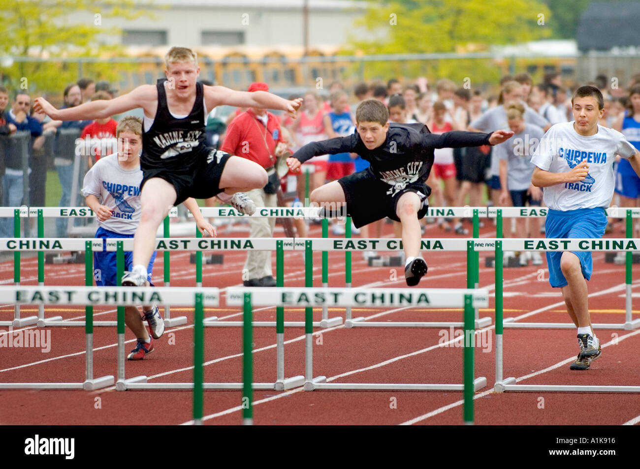 Middle school ages teens participate in track and field events Stock ...