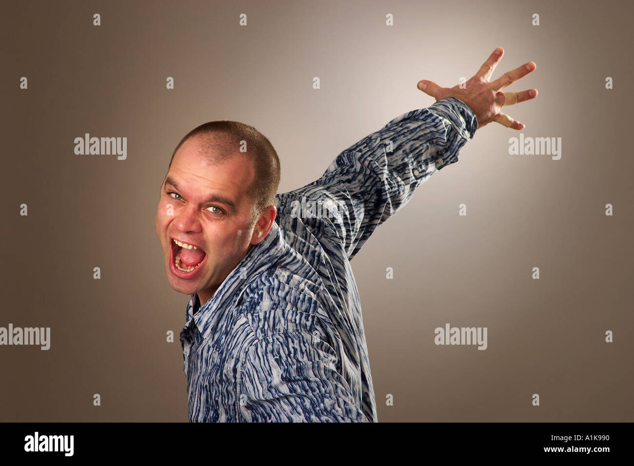 MR Cheering man Stock Photo - Alamy