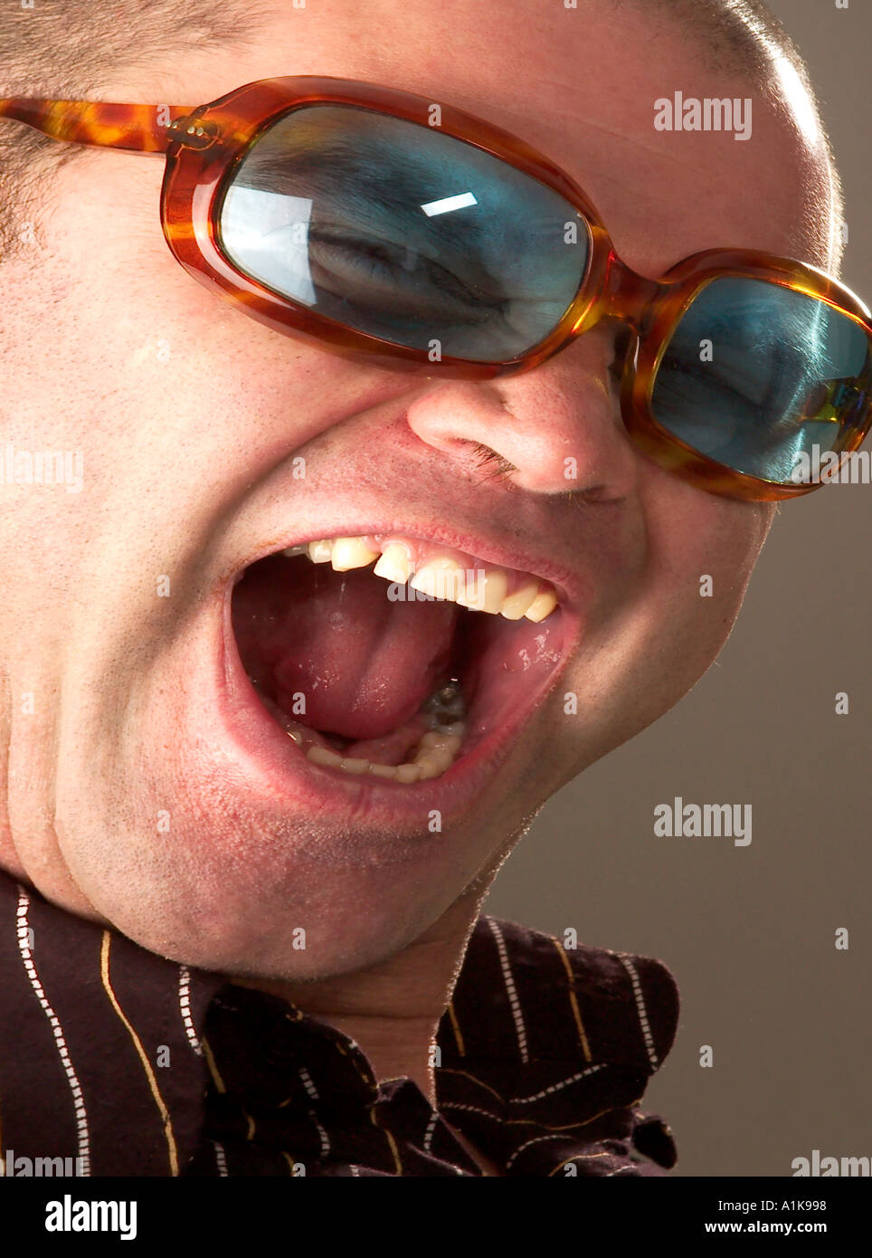 MR Cool guy looks like Elton John Stock Photo - Alamy