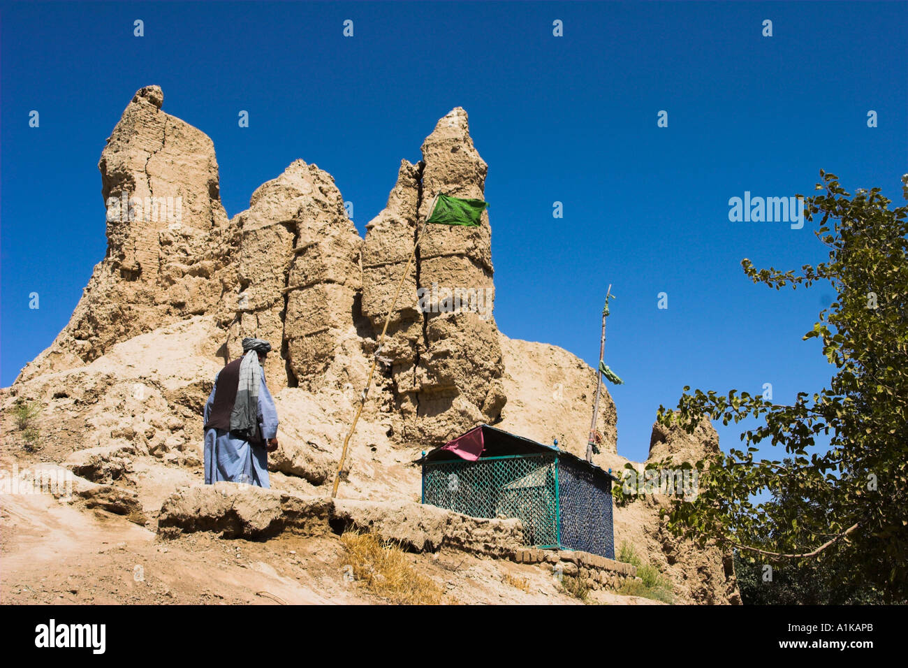 AFGHANISTAN Balkh Mother of Cities Man walking to shrine Ancient walls ...
