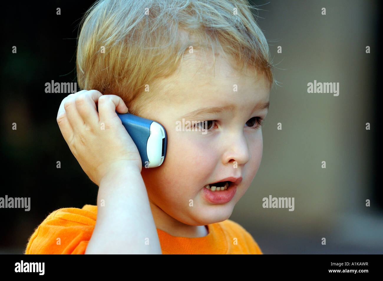 Boy with mobile phone Stock Photo - Alamy