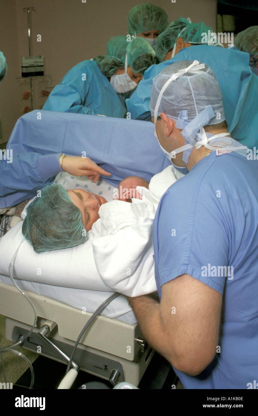 Birth baby medical doctor nurse new born miracle hi-res stock ...