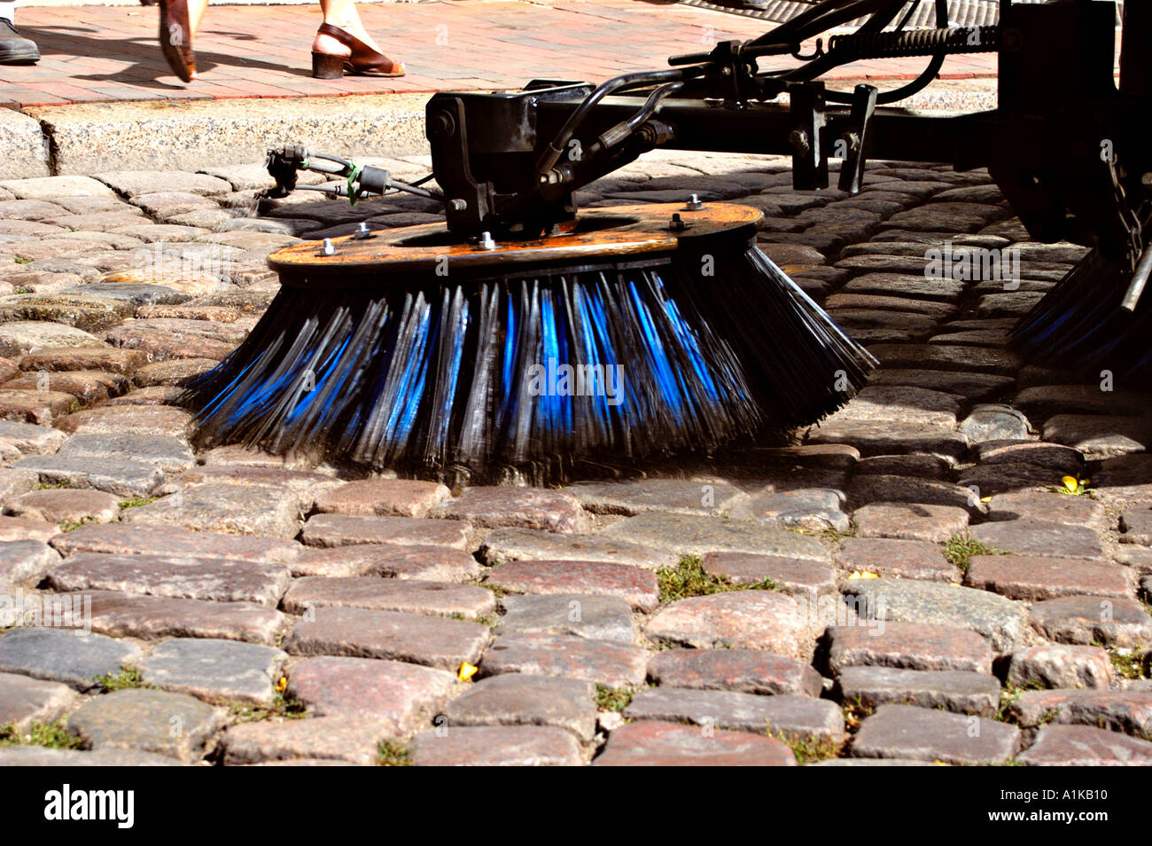 Cleaning after a parade Stock Photo - Alamy