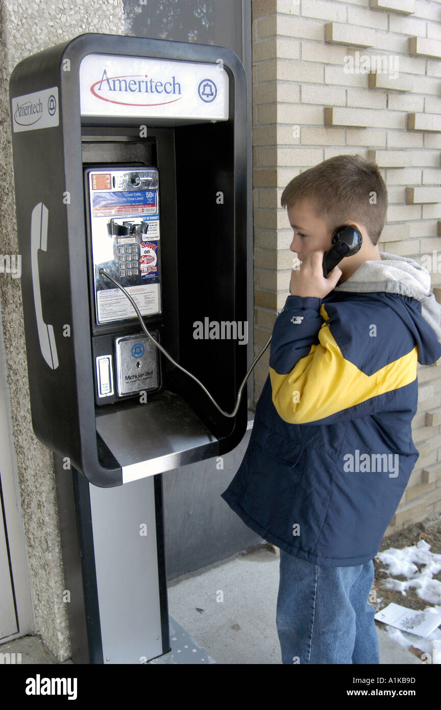 9 year old boy pay phone hi-res stock photography and images - Alamy