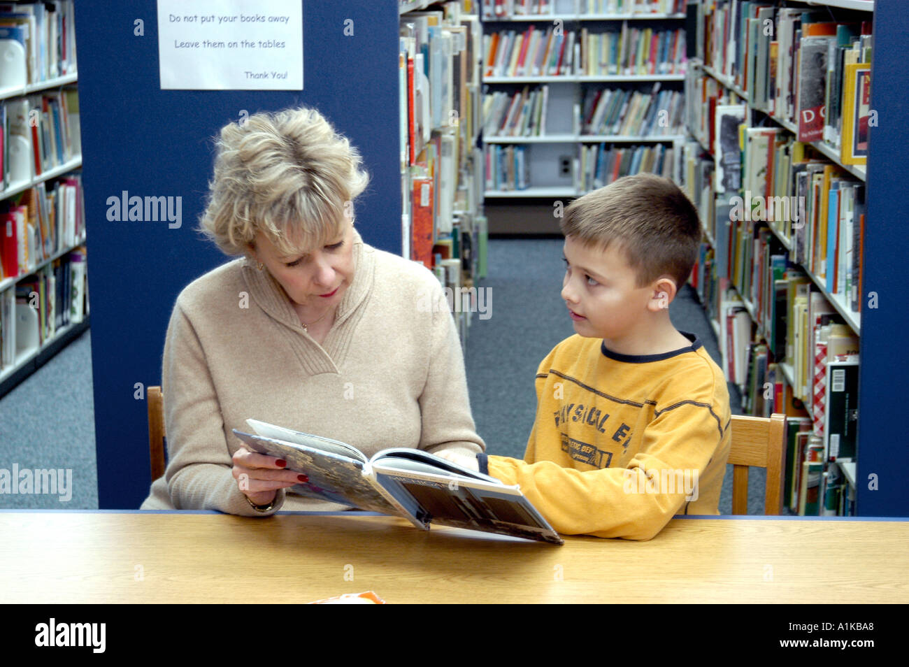 Grandmother reading to class hi-res stock photography and images - Alamy