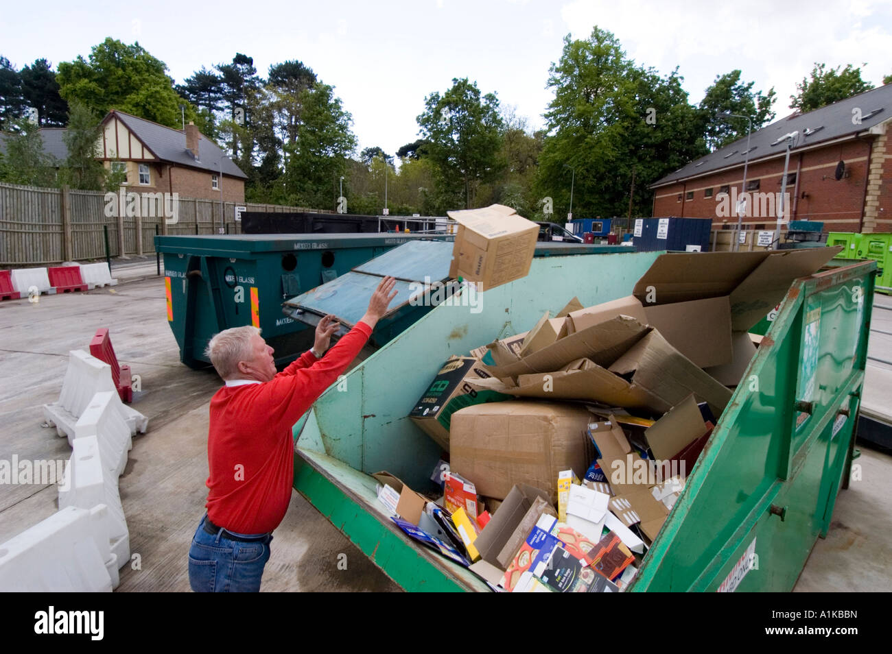 Disposing of Cardboard at a Recycling Centre Stock Photo - Alamy