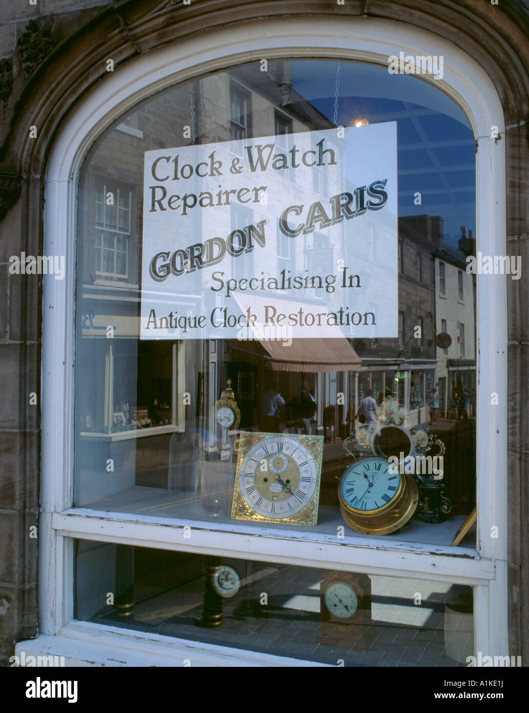 Antique clock restorer's shop window, Alnwick, Northumberland, England ...