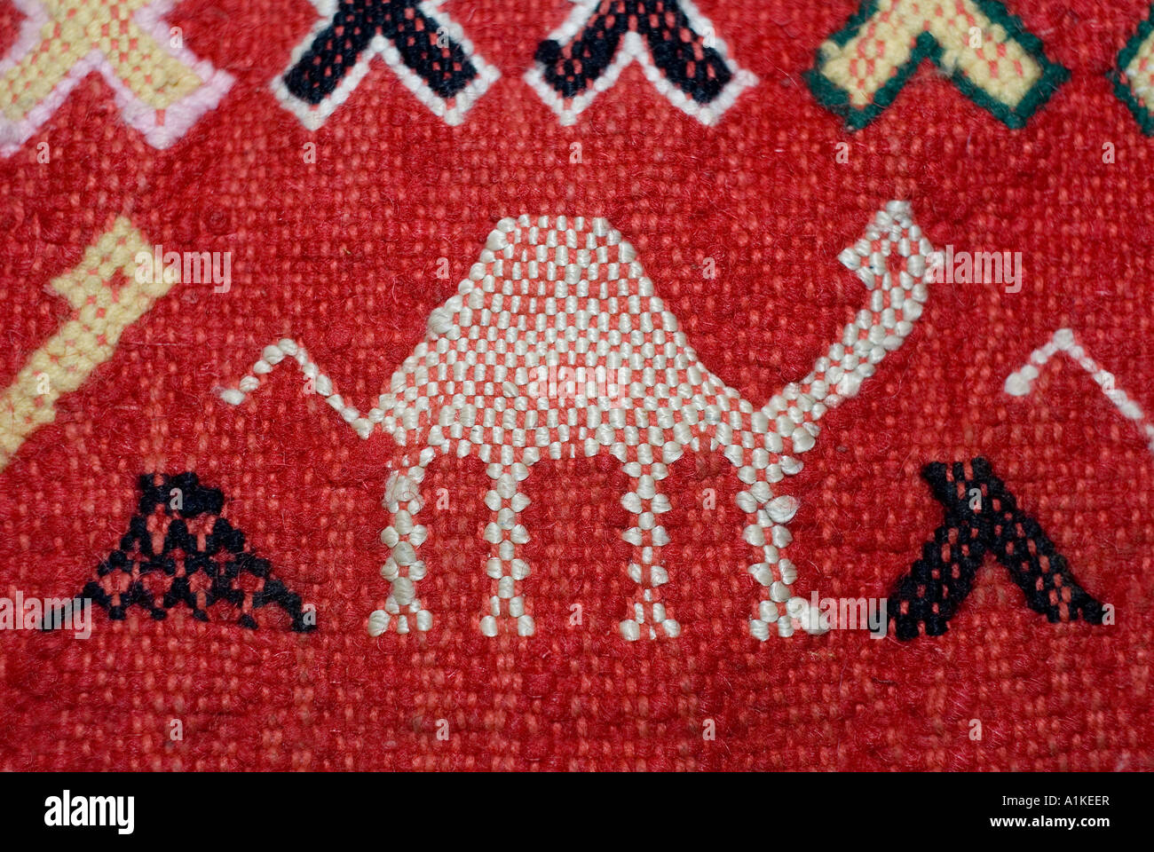 Woven woollen textile with camel motifs from Morocco Stock Photo - Alamy