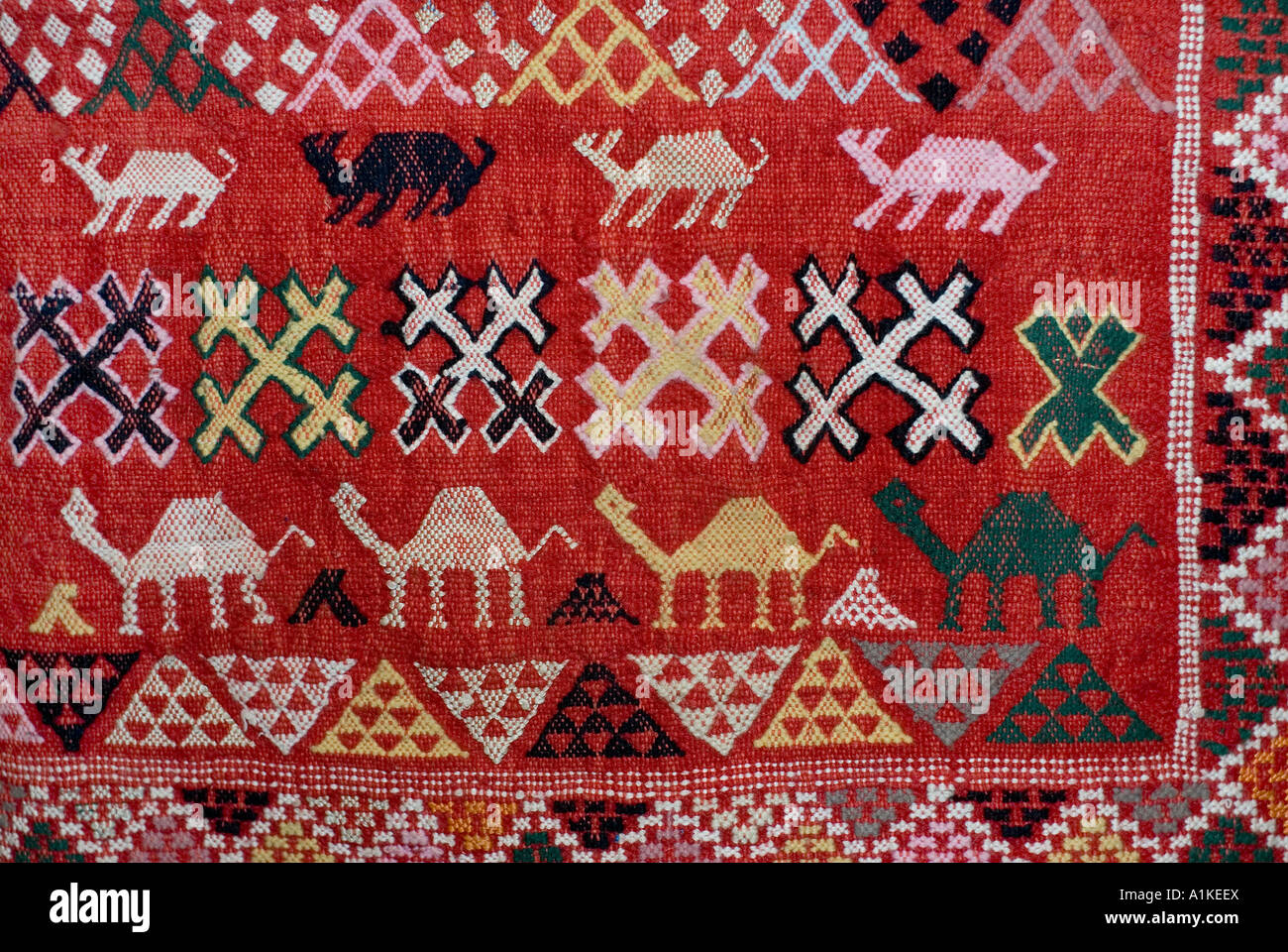 Woven woollen textile with camel motifs from Morocco Stock Photo - Alamy