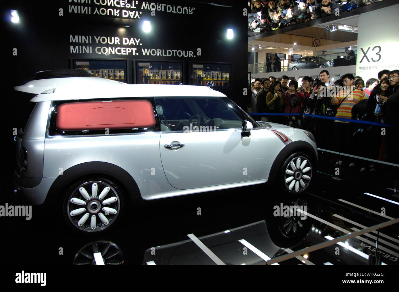 Visitors view MINI COOPER during the 2006 International Automotive ...