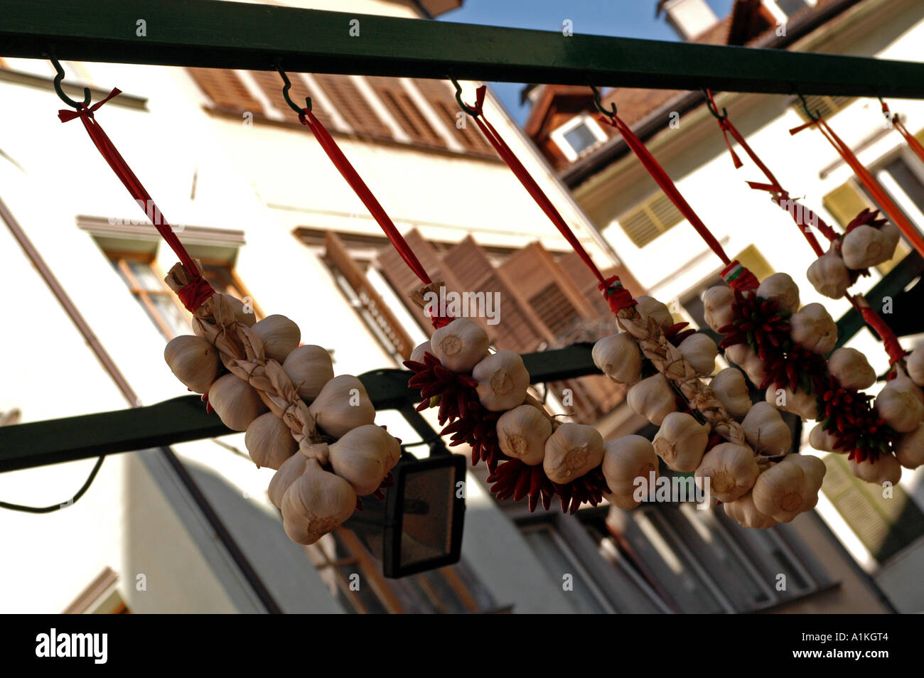 Garlic and chilli peppers on display at the fruit and veg market in ...
