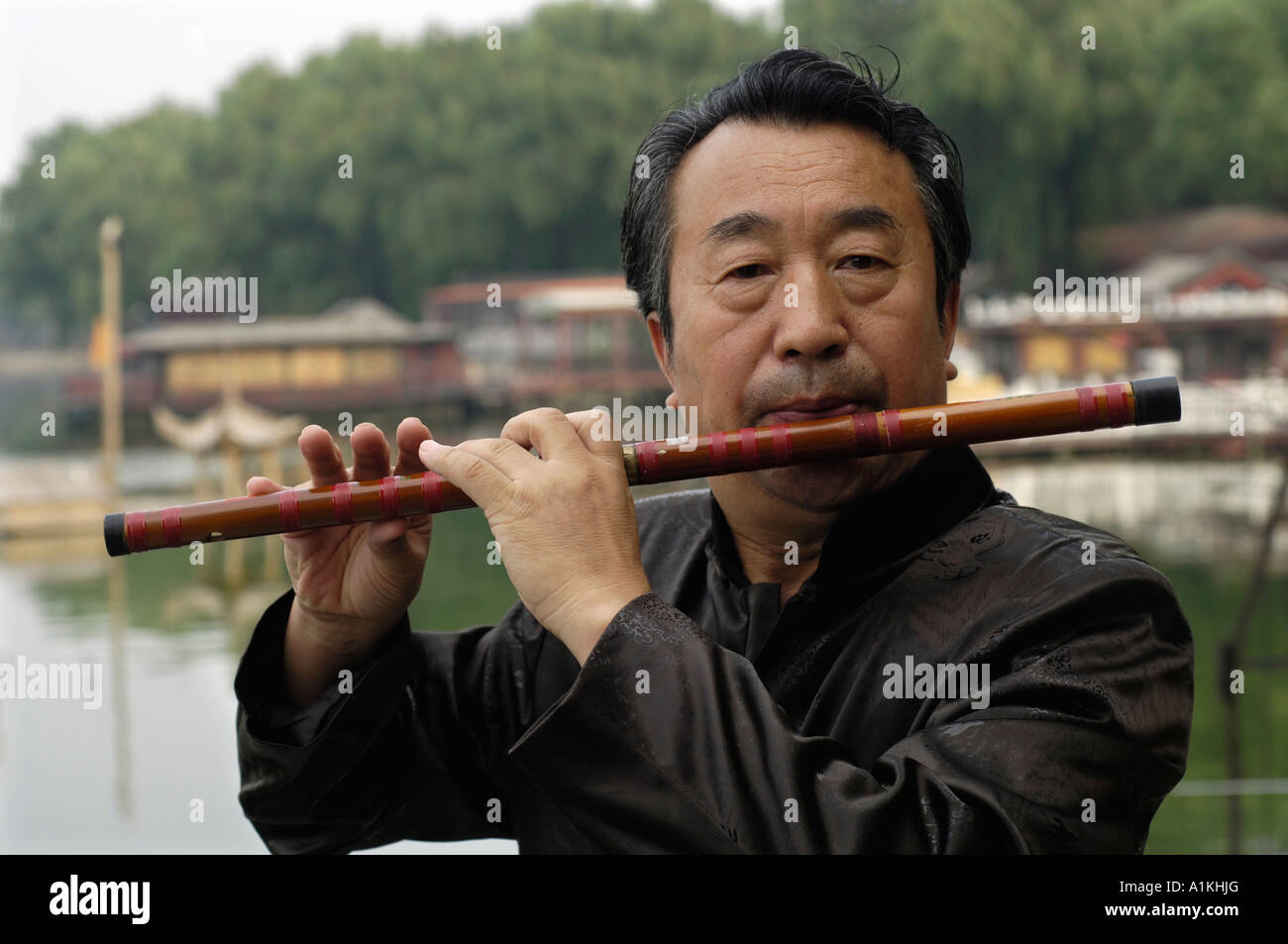Beijing residents play Chinese folk musical instrument Stock Photo - Alamy