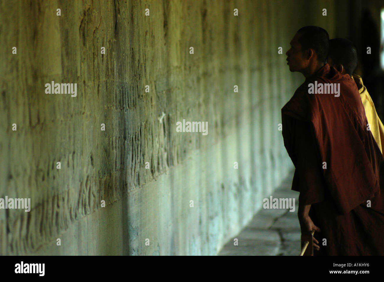 Buddhist Monks viewing Bas Reliefs at Angkor Wat Temple, Siem Reap ...
