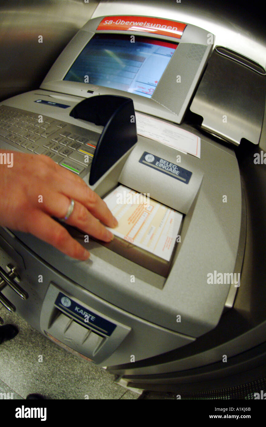 Woman at till bank hi-res stock photography and images - Alamy