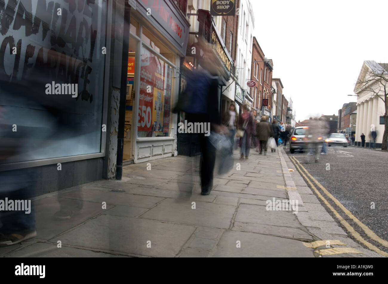 shoppers in a high street Stock Photo - Alamy
