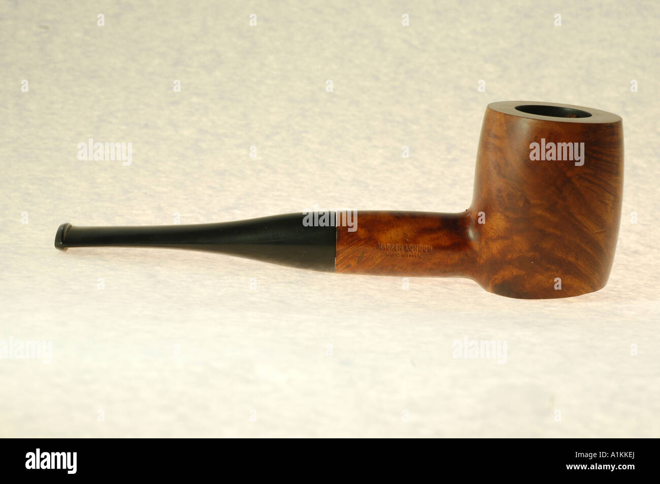 still life Old wooden pipe on white background Stock Photo - Alamy