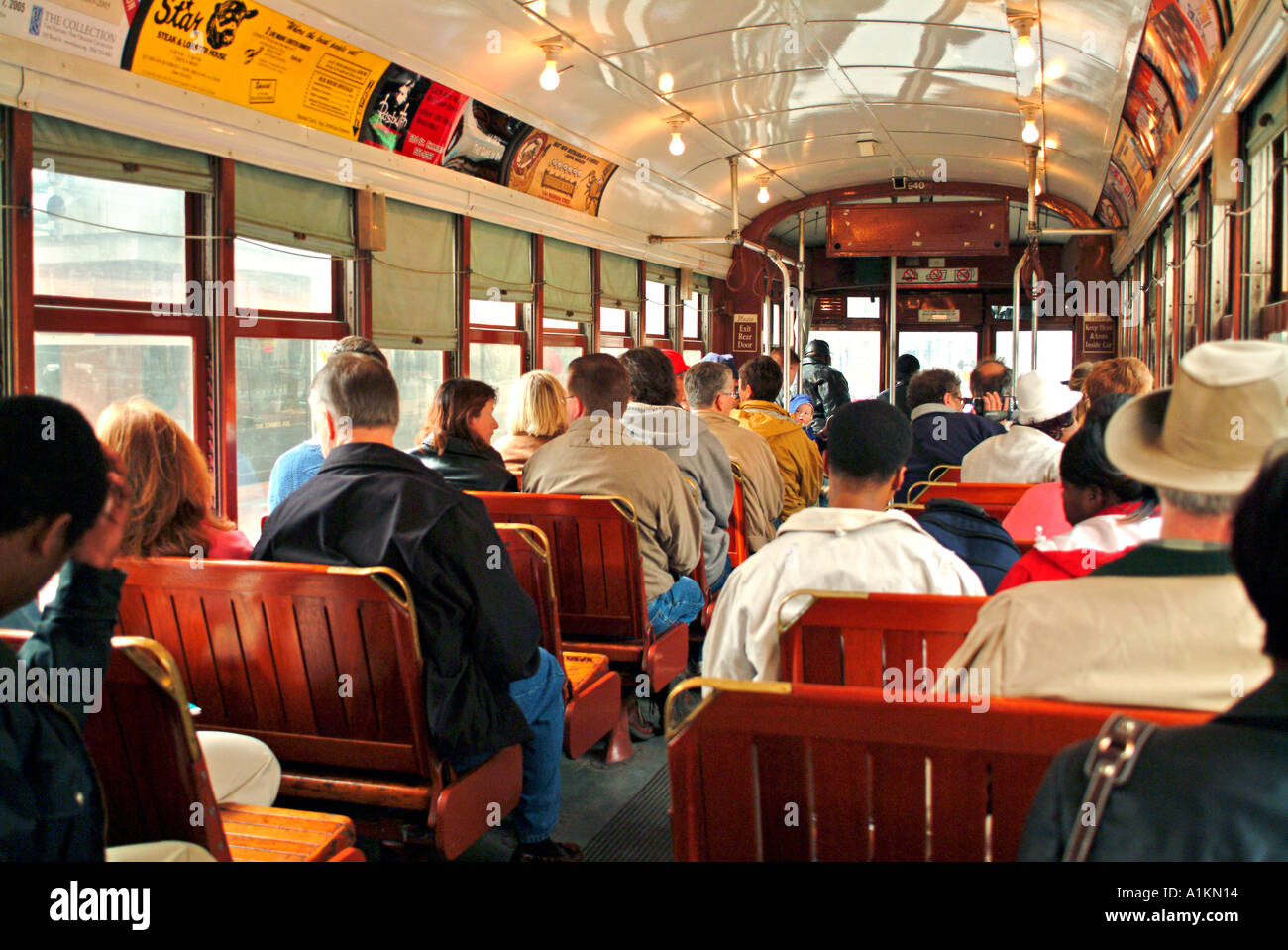 Interior of New Orleans streetcar with passengers Stock Photo - Alamy