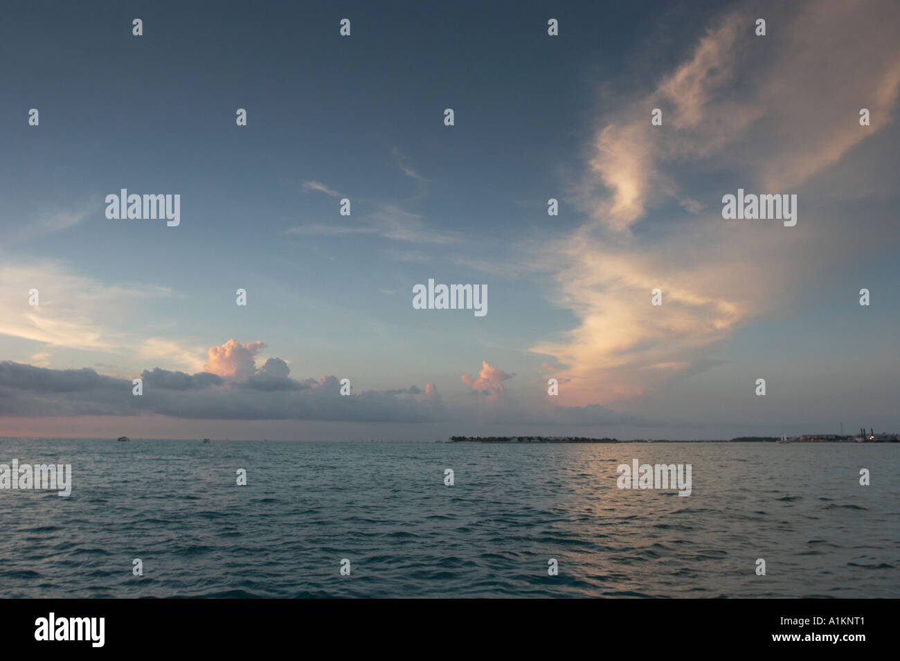 Clouds over the ocean at sunrise in the Florida Keys Stock Photo - Alamy