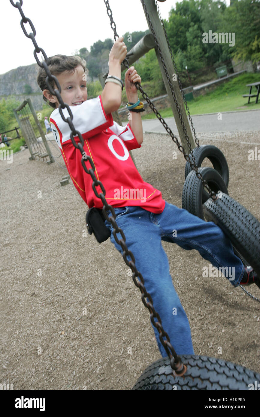 BOY IN PLAYGROUND Stock Photo - Alamy
