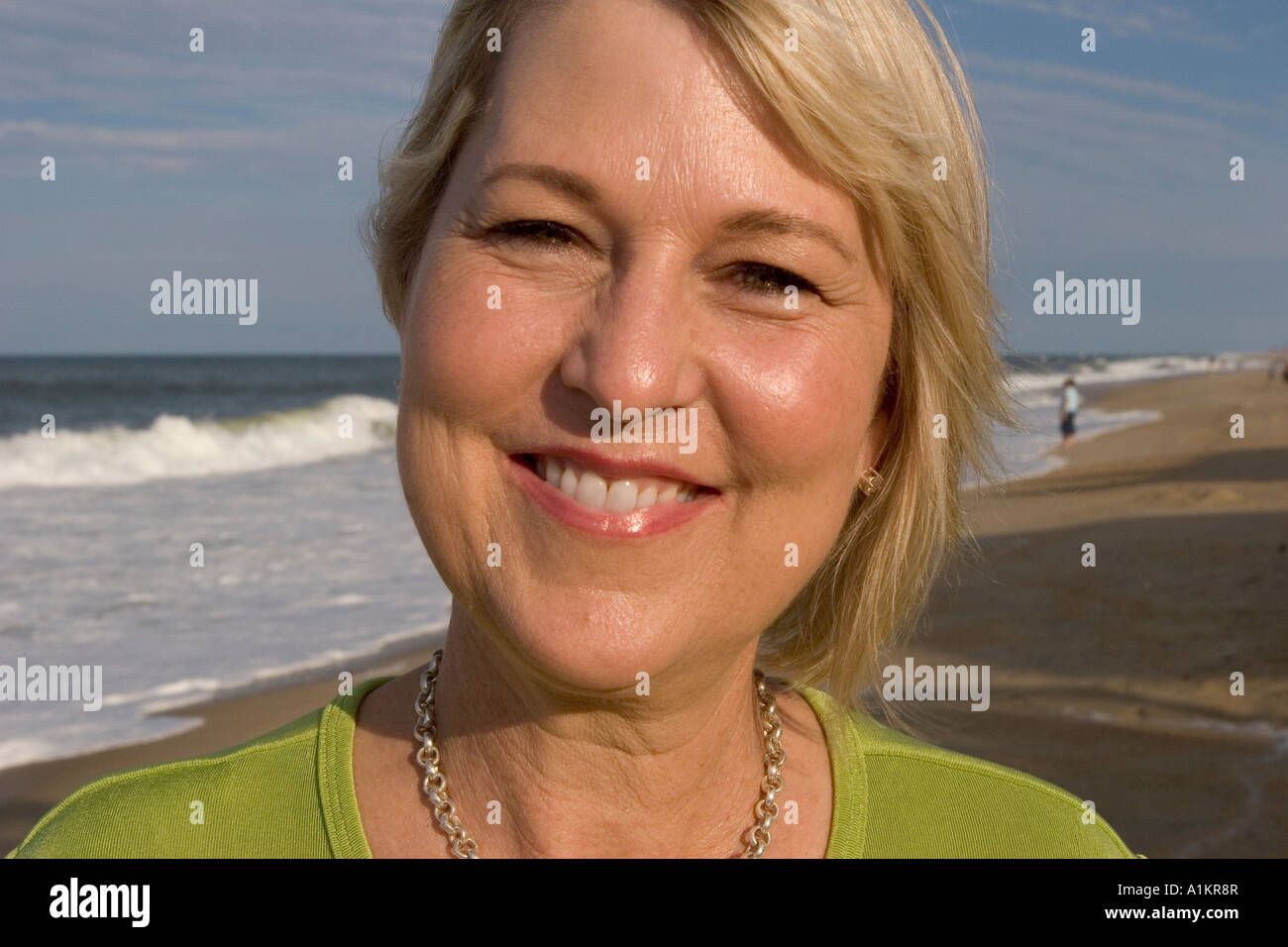 Friendly woman on vacation Stock Photo - Alamy