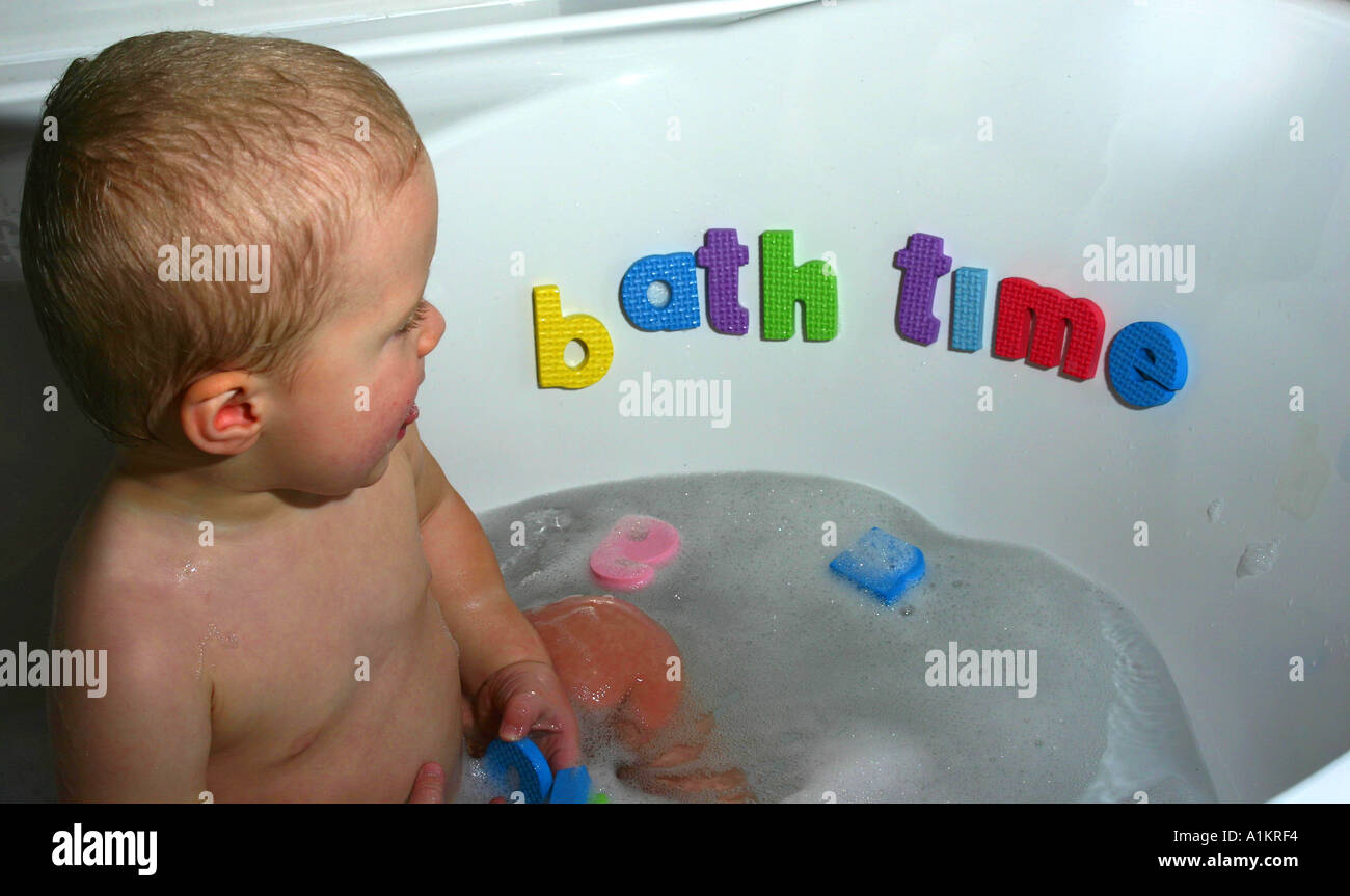 Baby in bath with lettering implying extra intelligence Baby bathtime ...